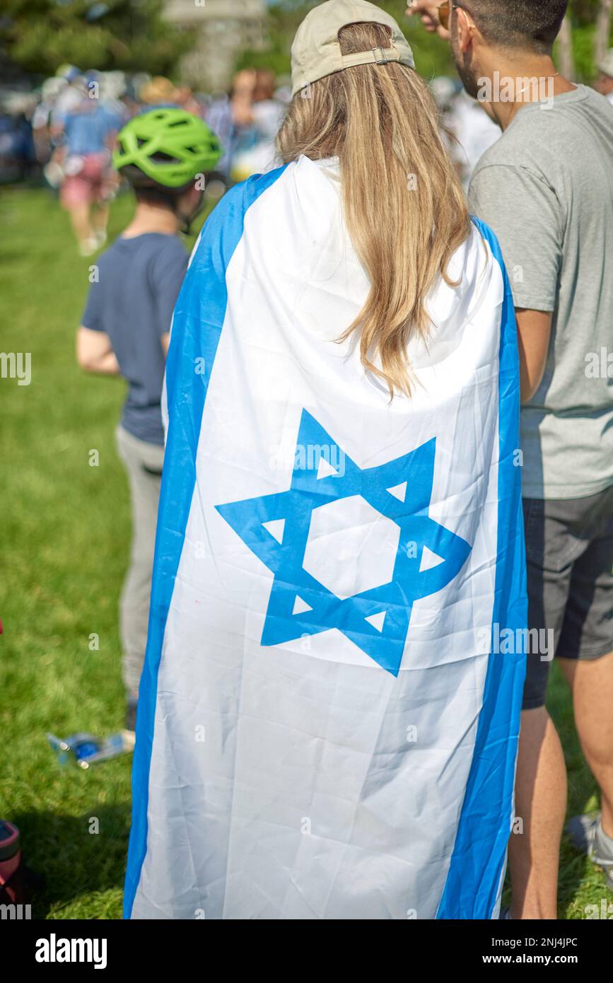 Toronto, Ontario Canada- May 29th, 2022: a mom wearing the Israeli flag ...