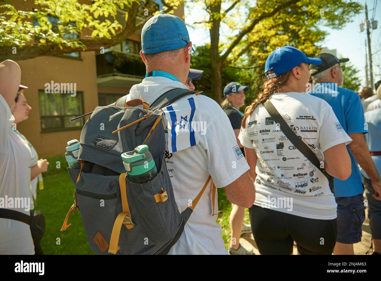 Toronto, Ontario Canada- May 29th, 2022: A man walking with the Israeli ...