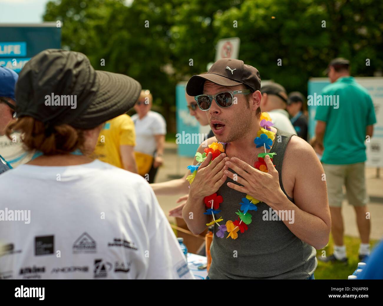Toronto, Ontario Canada- May 29th, 2022: A two people talking to each ...