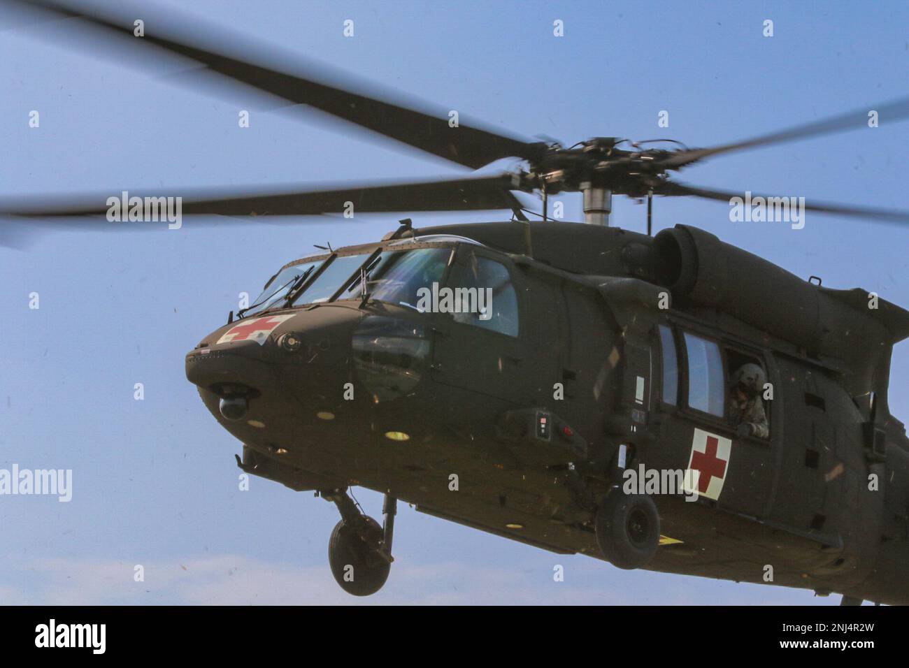 An aircrew assigned to Charlie "Arctic Dustoff" Company, 1-52 General ...