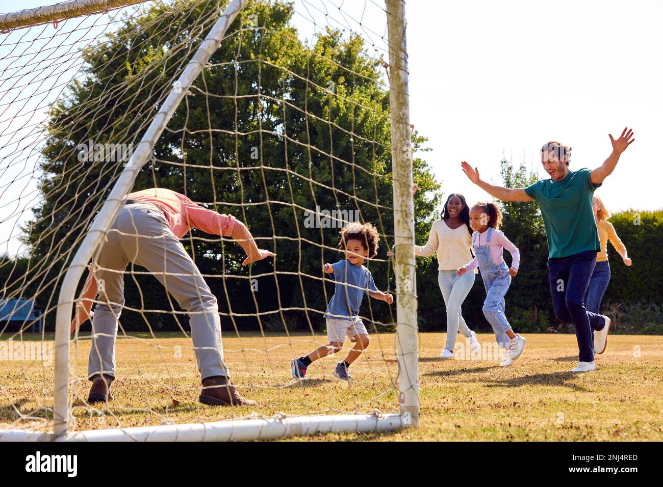 African boy girl playing soccer hi-res stock photography and images - Alamy