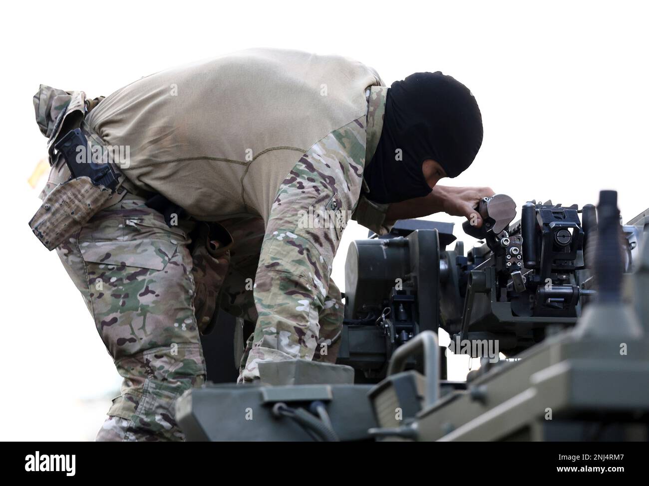 A soldier of the Spanish Army in a tank before the solemn act of homage ...