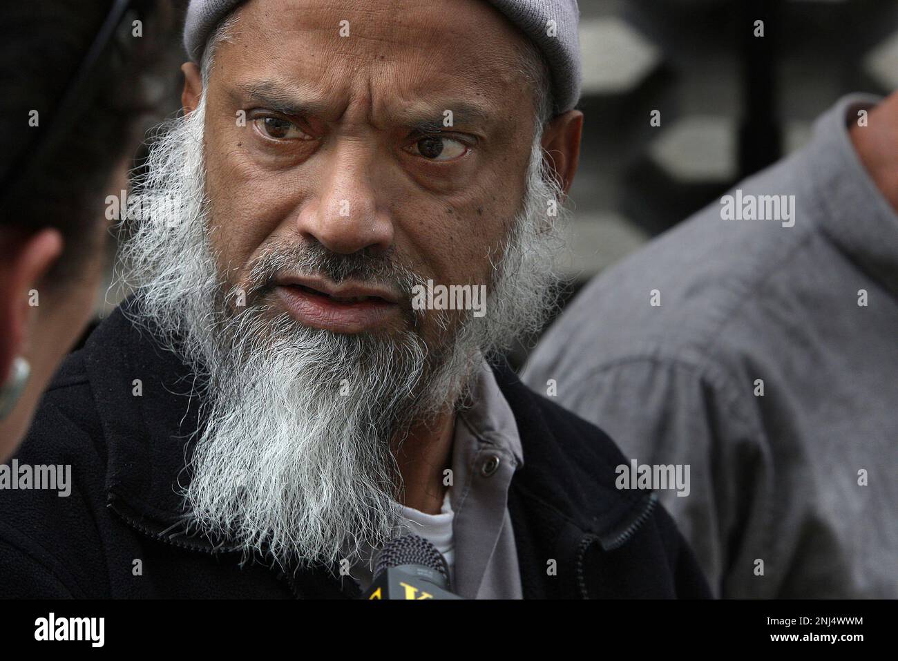 The father of Mohammed Haroon Ali comments to press in front of the ...
