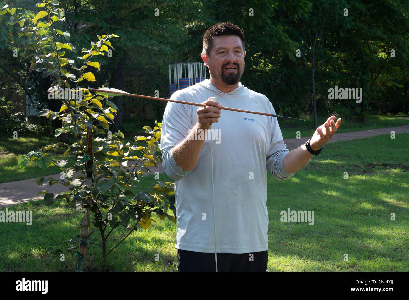 Nate Bunch, Cherokee Cultural Center, shows a cornstalk arrow during a ...