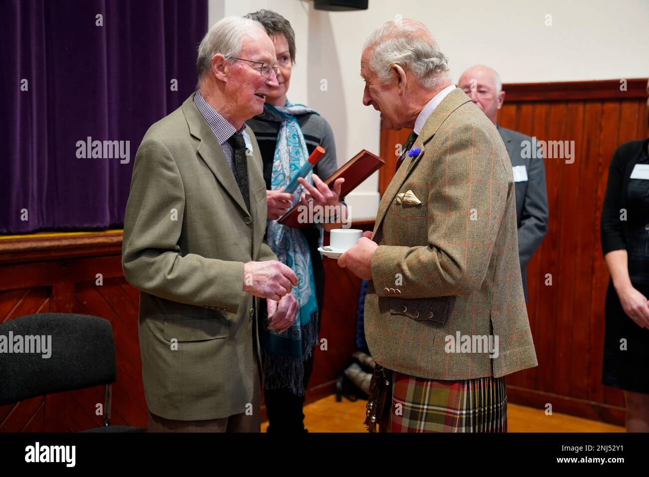 King Charles III speaks to the Rev Addie, left, a Ballater resident who ...