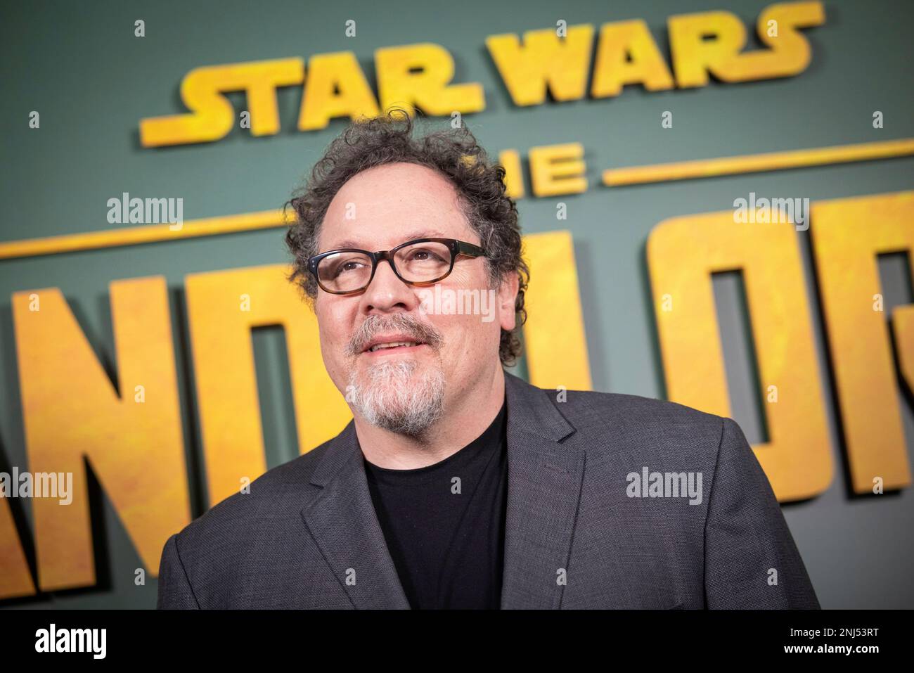 Jon Favreau poses for photographers during a photo call to promote the ...
