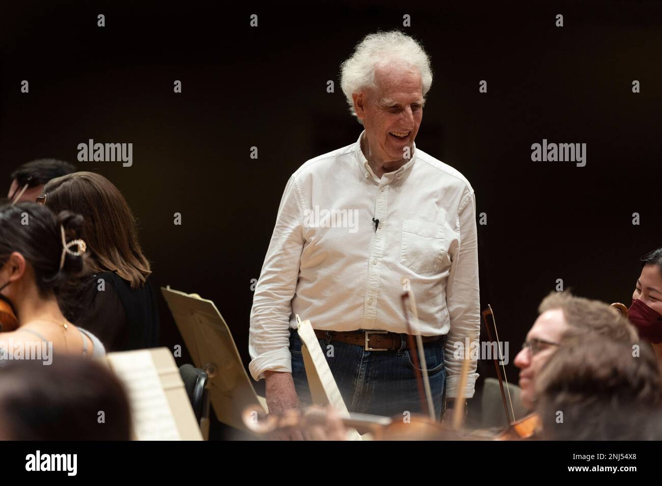 Benjamin Zander speaks with musicians during a rehearsal of Beethoven's ...