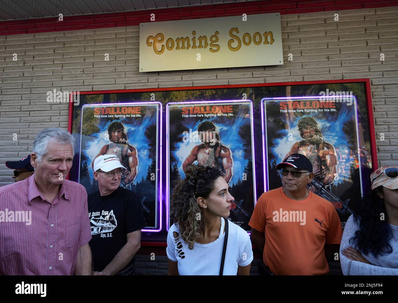 Rambo "First Blood" posters are hung outside the Hope Cinema during a ...