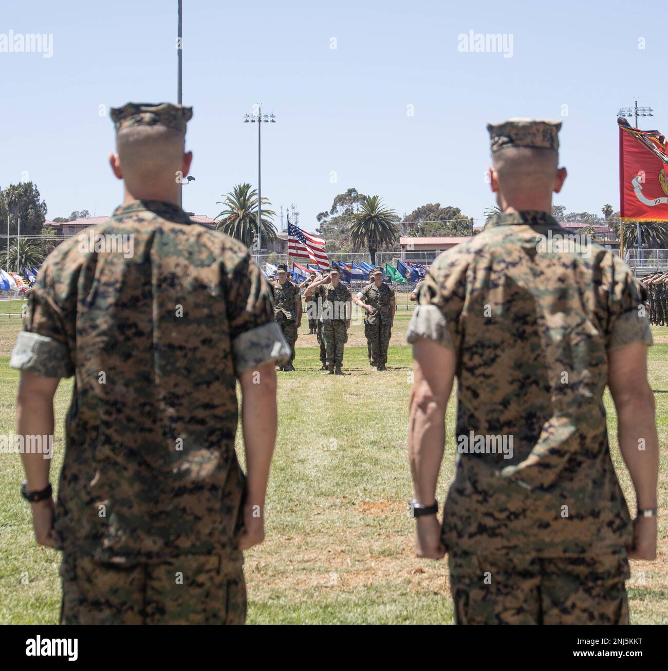 U.S. Marine Corps Col. Seth W. B. Folsom, right, the outgoing ...