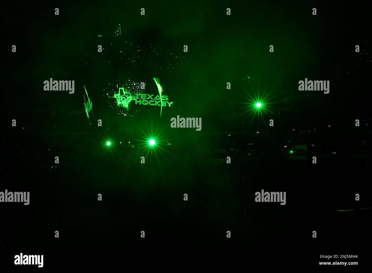 Dallas Stars green logo, green starbursts and Texas hockey seen on the ...