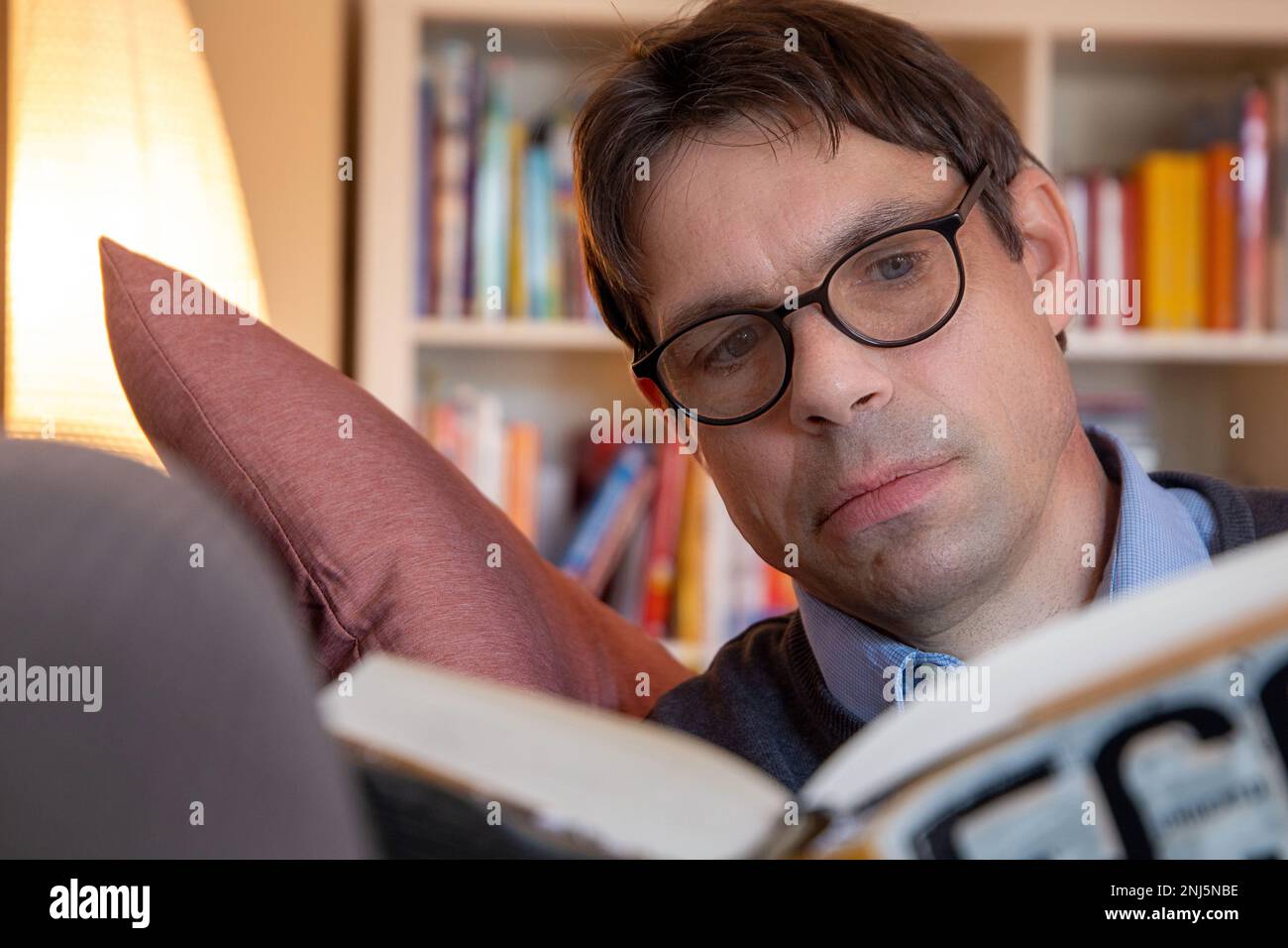 Man reading (symbol image, model released Stock Photo - Alamy