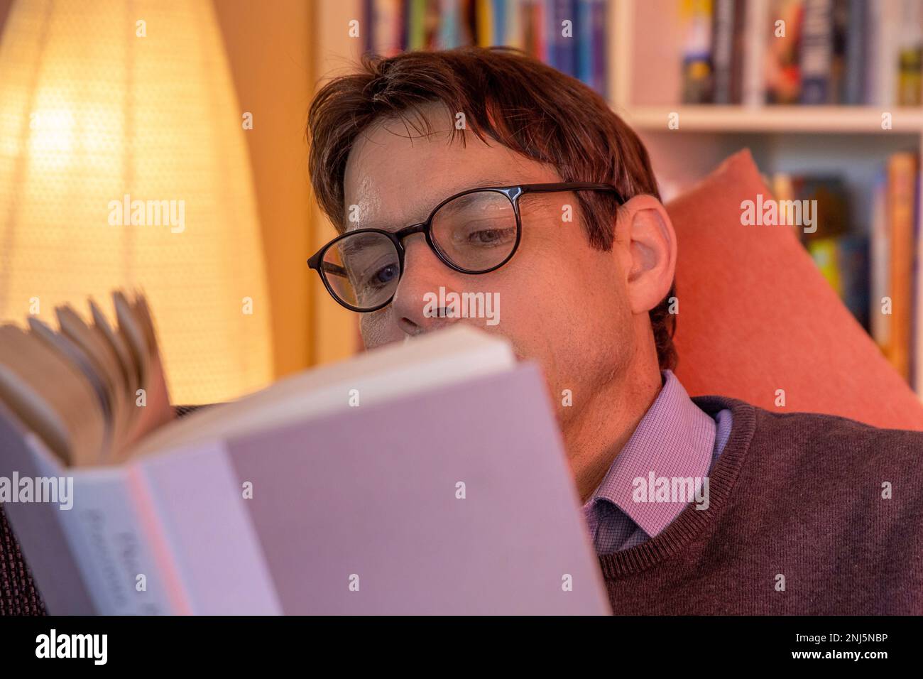 Man reading (symbol image, model released Stock Photo - Alamy