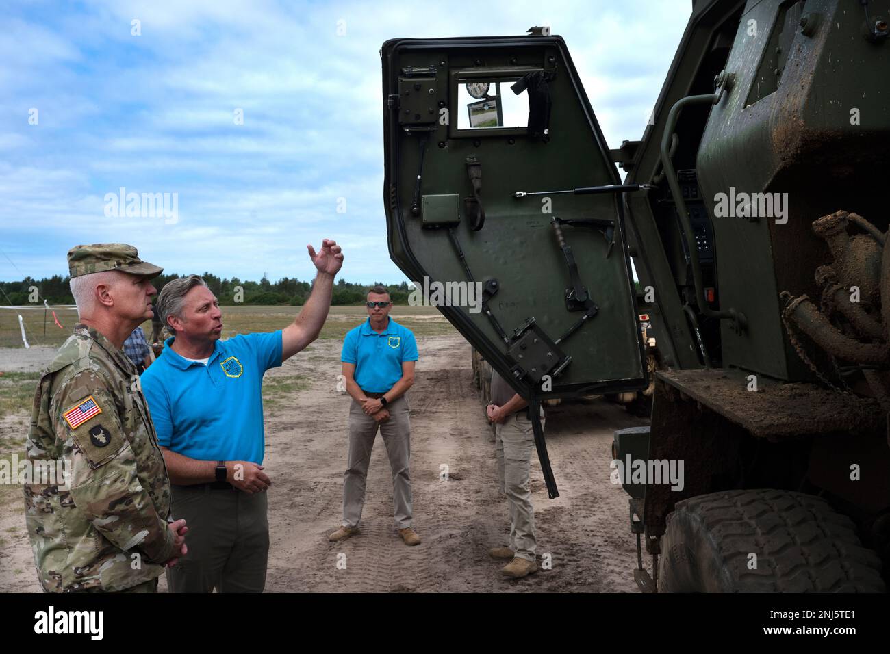 Lt. Gen. Jon Jensen, director of the Army National Guard, listens as ...