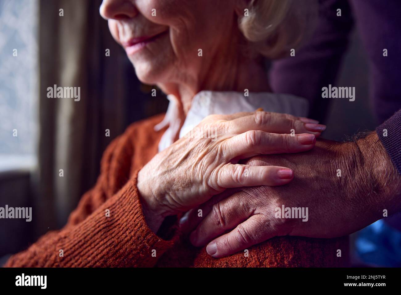 Two men hand on shoulder hi-res stock photography and images - Alamy