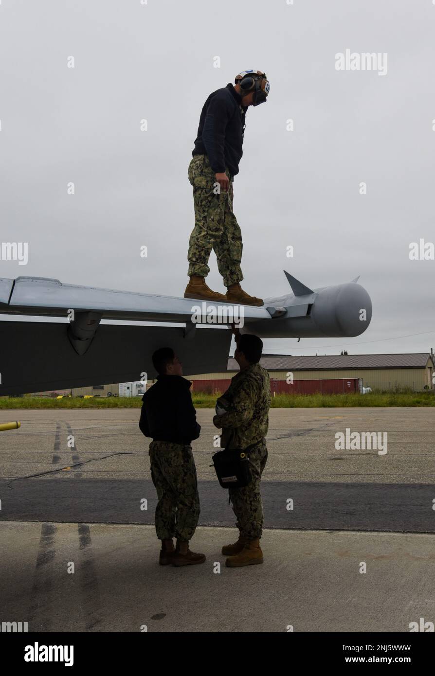 U.S. Sailors assigned to Electronic Attack Squadron 131 perform a pre ...