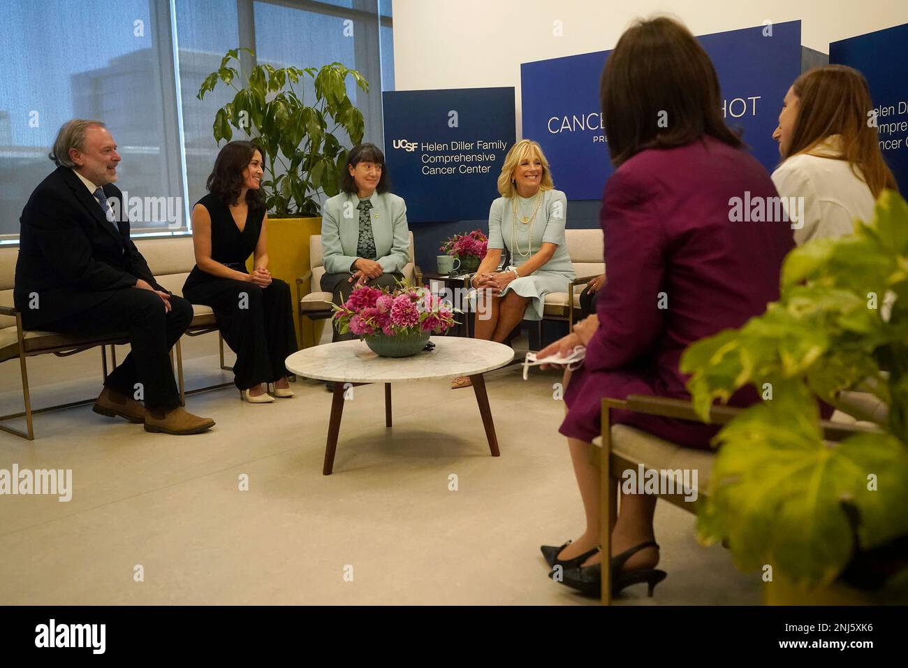 First lady Jill Biden, middle right, smiles while meeting with Dr. Alan ...