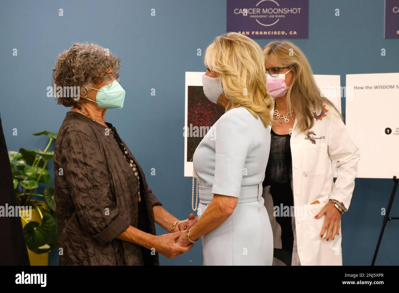 First lady Jill Biden, middle, talks with cancer patient Penny ...