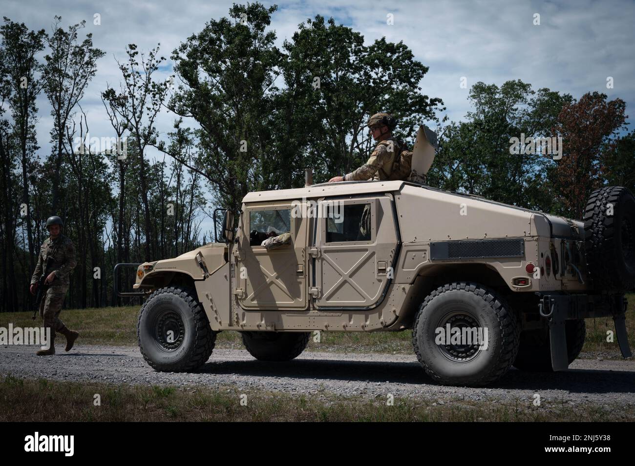 U.S. Air Force Airmen conduct a sweep during counter improvised ...