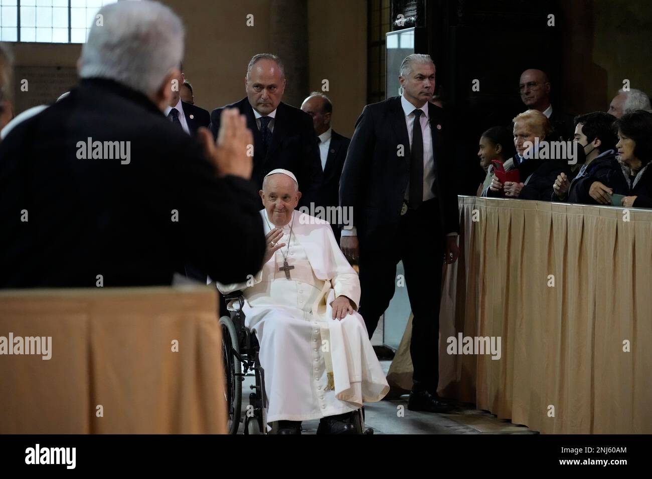 Pope Francis, center, arrives at the Basilica of Santa Sabina in Rome ...