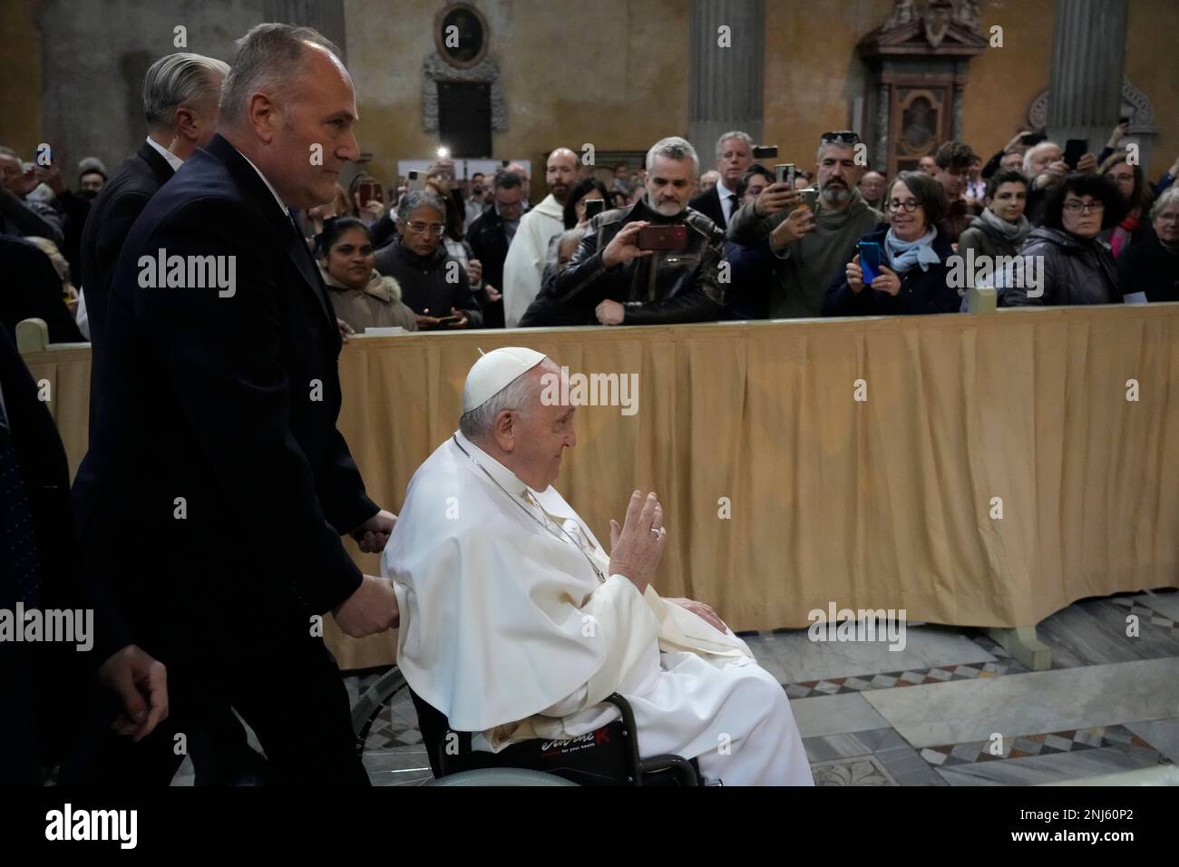 Pope Francis, center, arrives at the Basilica of Santa Sabina in Rome ...