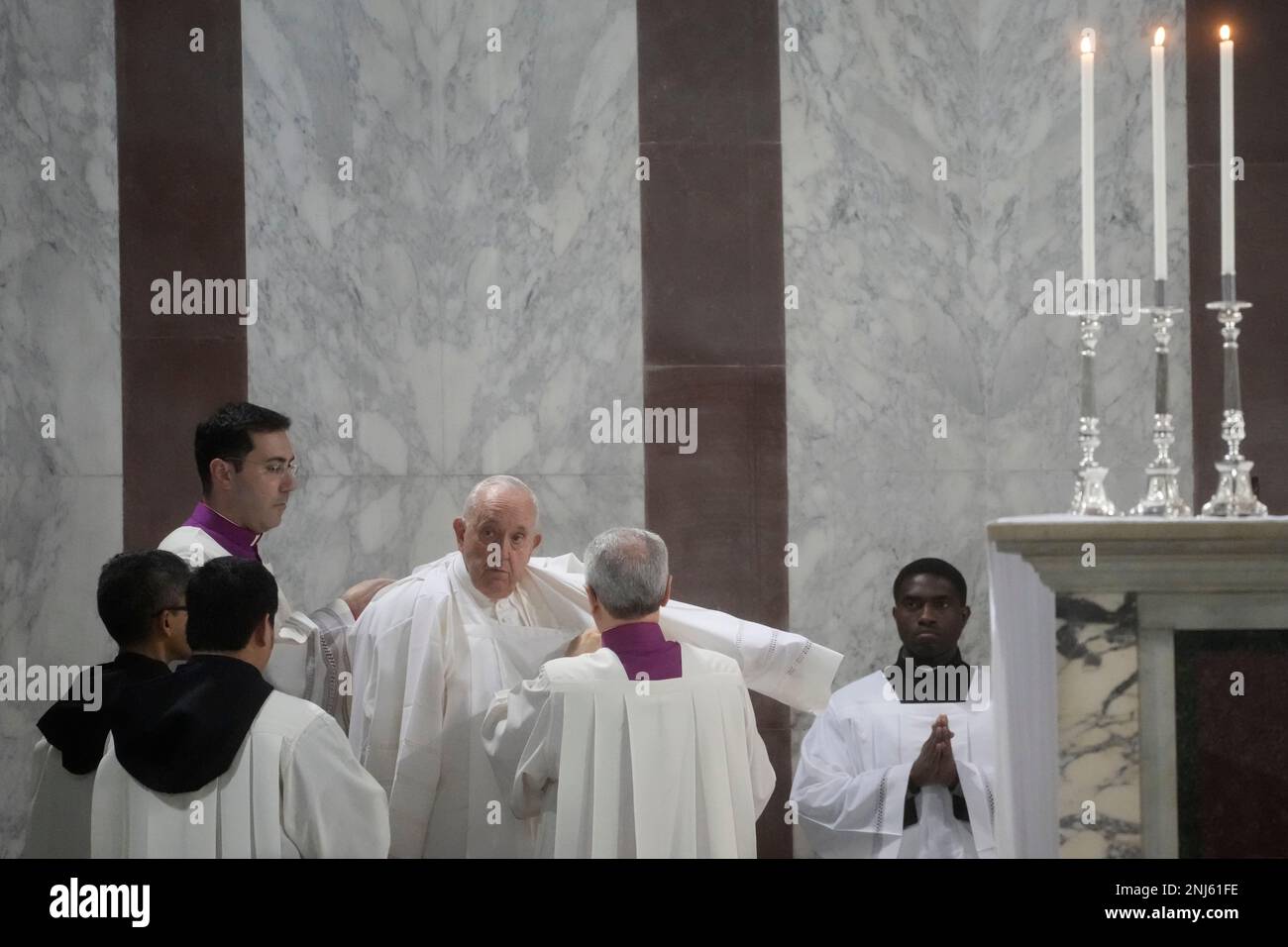 Pope Francis, center, arrives at the Basilica of Santa Sabina in Rome ...