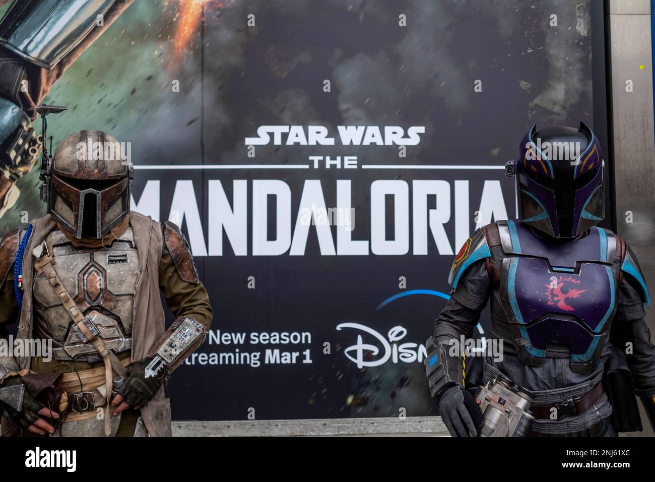 London, UK. 22 February 2023. Costumed re-enactors dressed as Mandalorians outside a pop-up ...