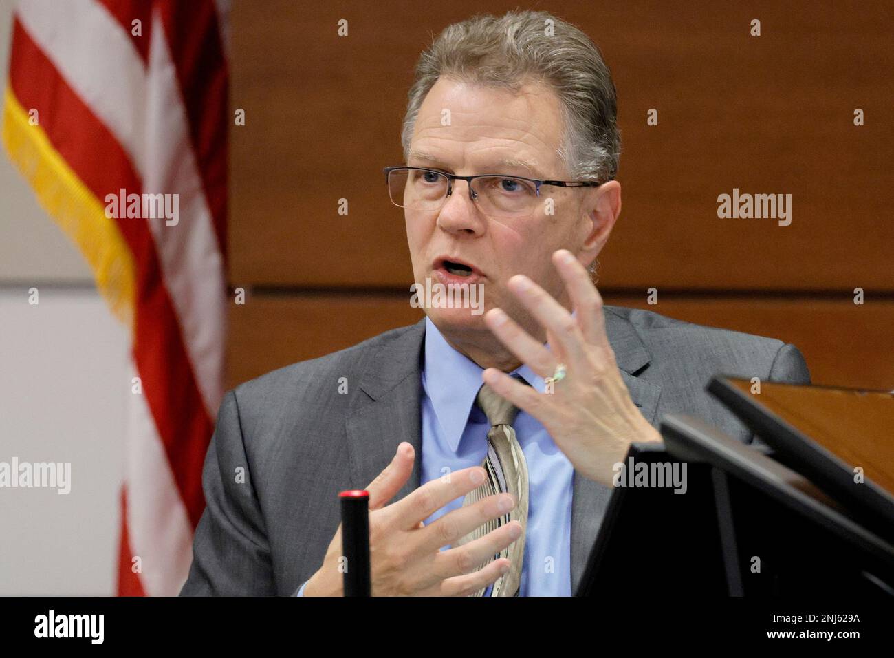 Clinical neuropsychologist Dr. Robert L. Denney testifies during the ...
