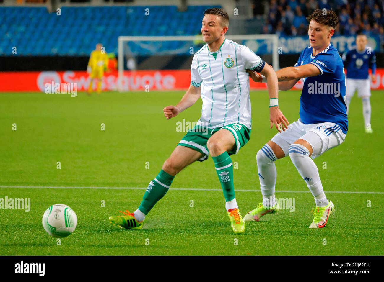 Molde's Mathias Lovik, right, and Shamrock Rovers' Ronan Finn in action ...