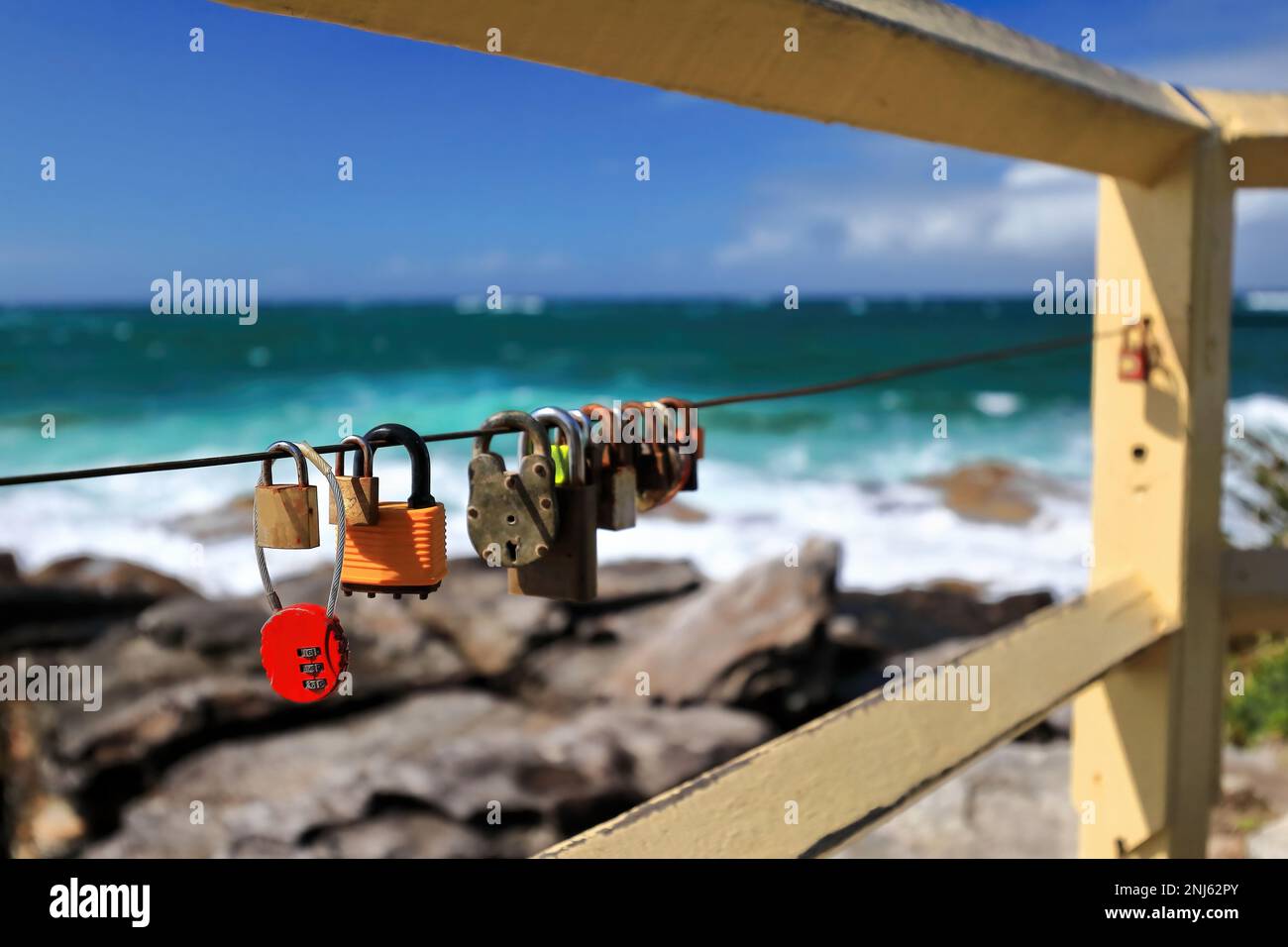 507 Love padlocks on the yellow painted railing running along the ...