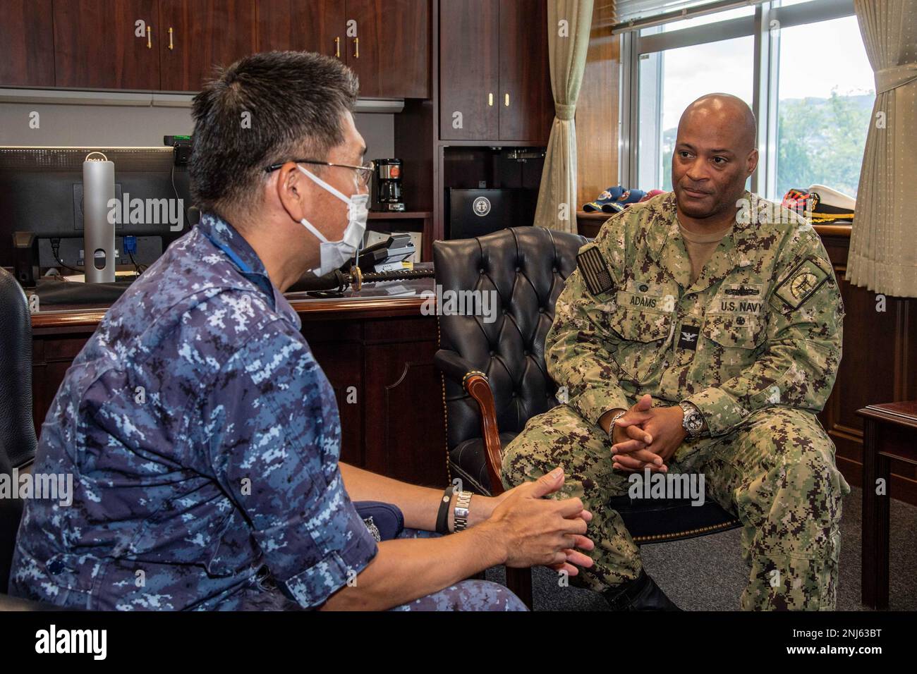 Capt. David Adams, Commander, Fleet Activities Sasebo (CFAS), meets ...