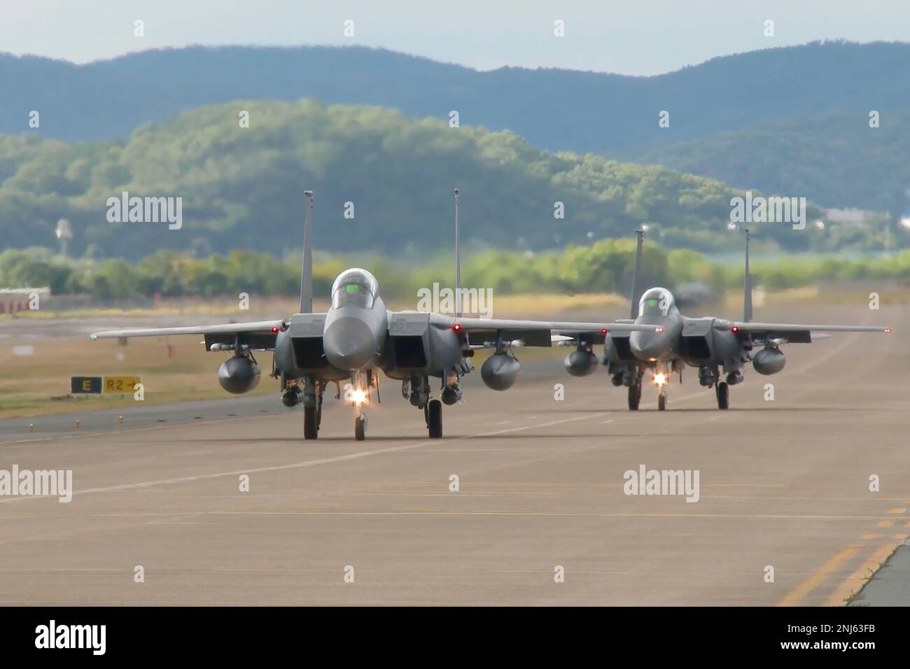 In this image taken from video, South Korean Air Force's F15K fighter jets prepare to take off ...