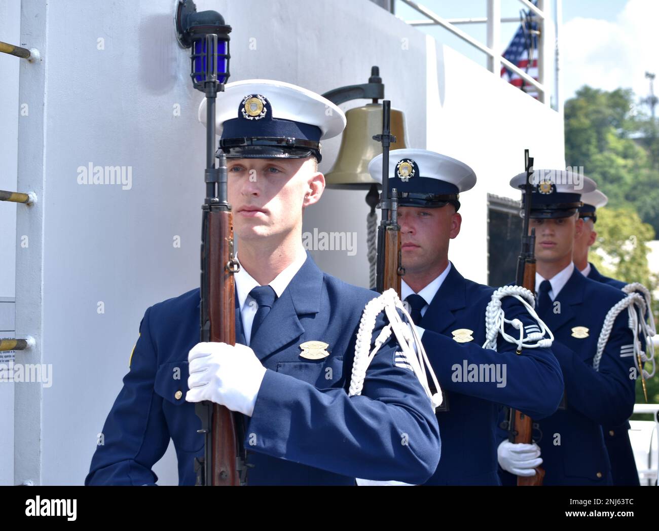 Members of the Coast Guard Ceremonial Honor Guard take their positions ...