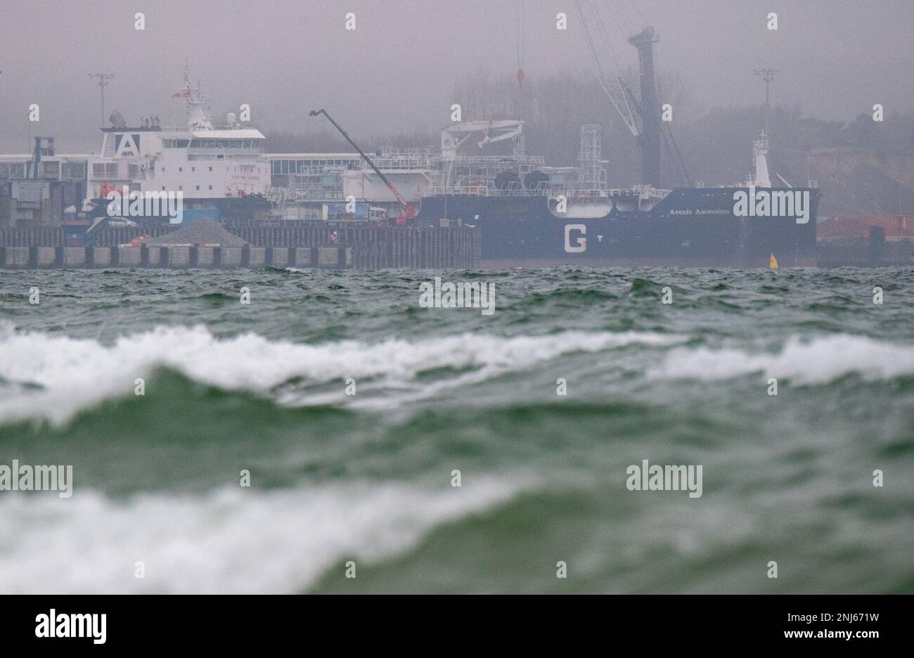 Mukran, Germany. 22nd Feb, 2023. The LNG tanker "Avenir Ascension" lies ...