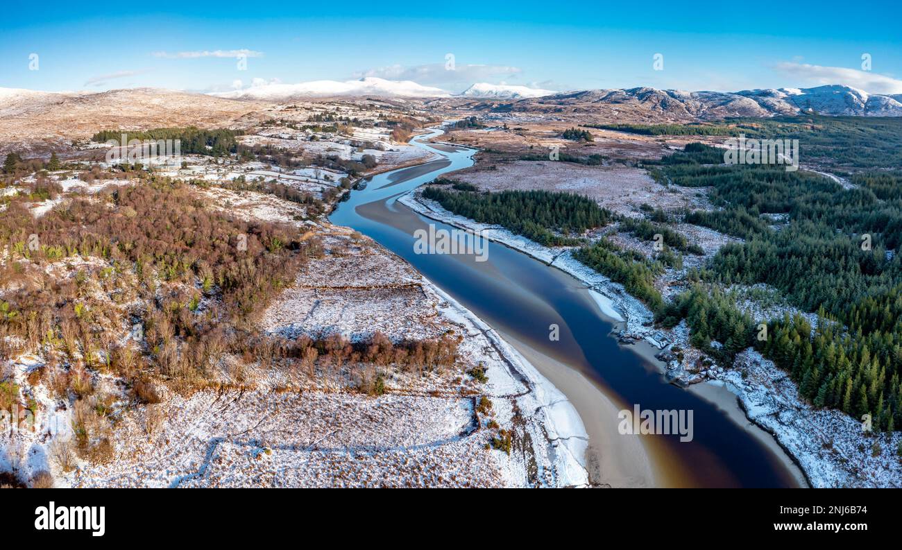 Aerial view of snow covered Gweebarra River between Doochary and ...