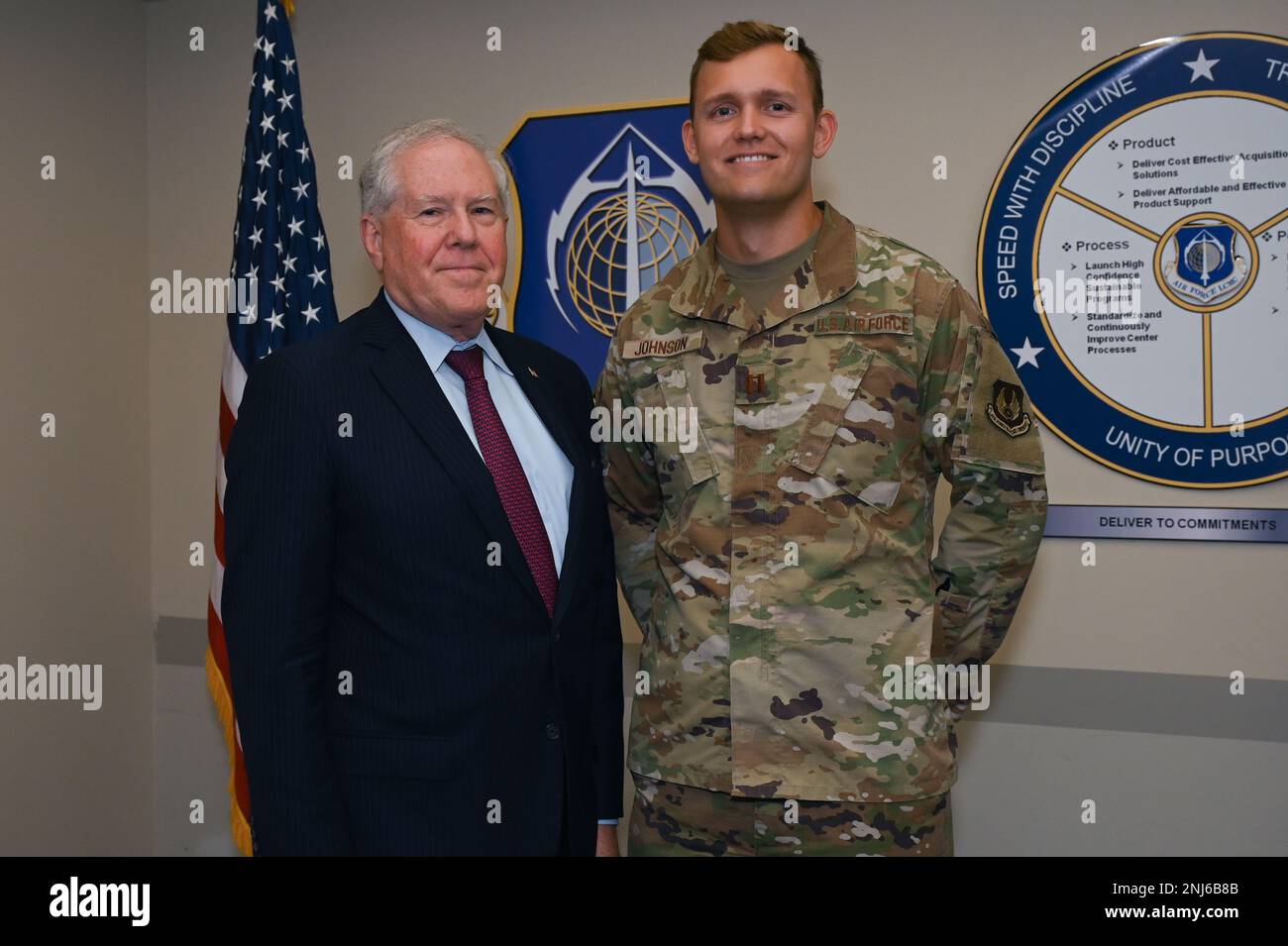 Secretary of the Air Force Frank Kendall stands for a photo with Capt ...
