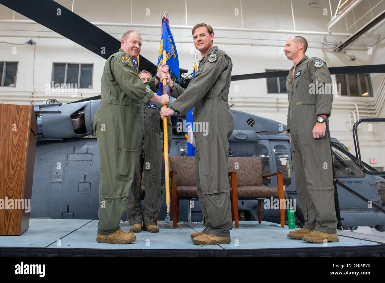 Colonel Jesse L. Hamilton, 943d Rescue Group commander, presents the ...