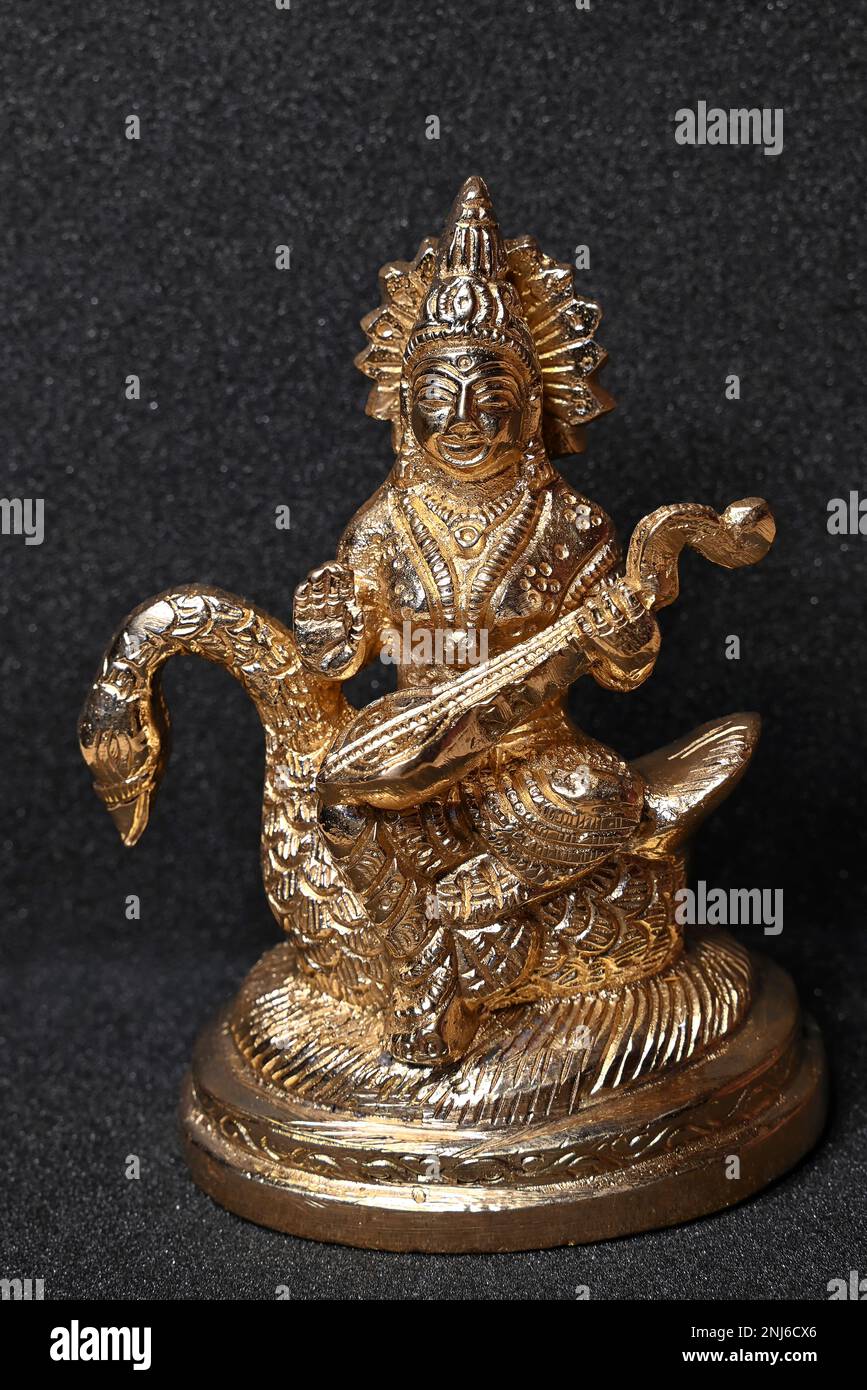 Closeup picture of Goddess Saraswati idol made by brass, devi Saraswati ...