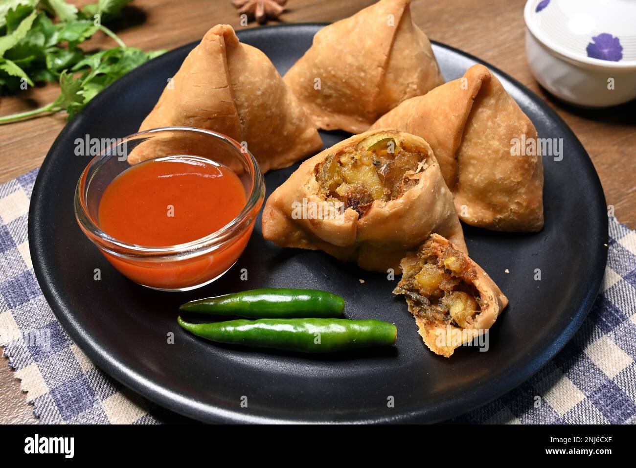 Picture of samosa or singara, a crispy and spicy triangle shape snack ...
