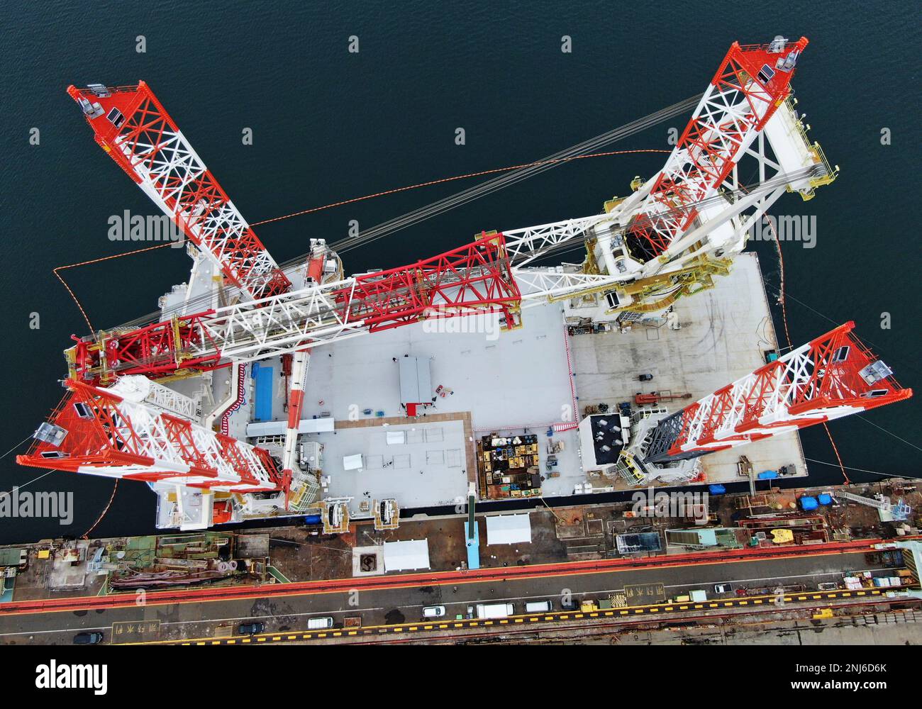 A photo shows Shimizu Corporation's SEP vessel (SEP: Self-Elevating ...