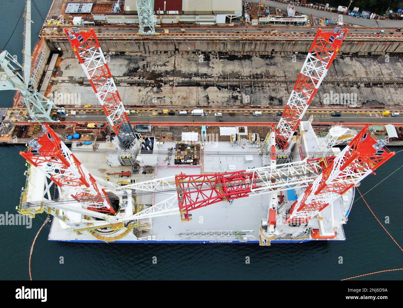 A photo shows Shimizu Corporation's SEP vessel (SEP: Self-Elevating ...