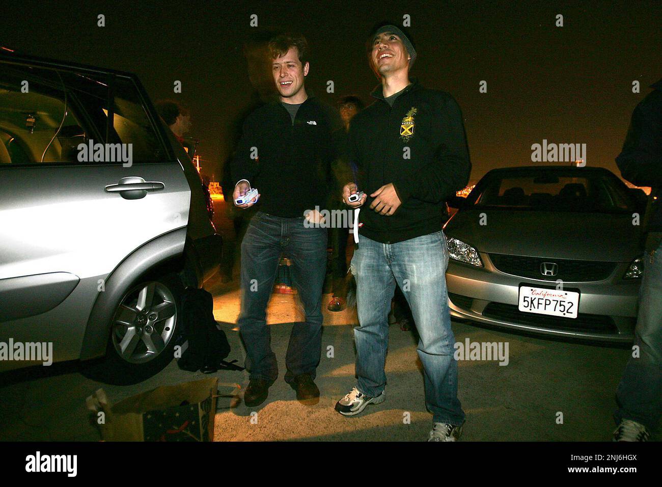 MOBMOV 003 LH .JPG Drive-in movies being shown in an abandoned parking ...