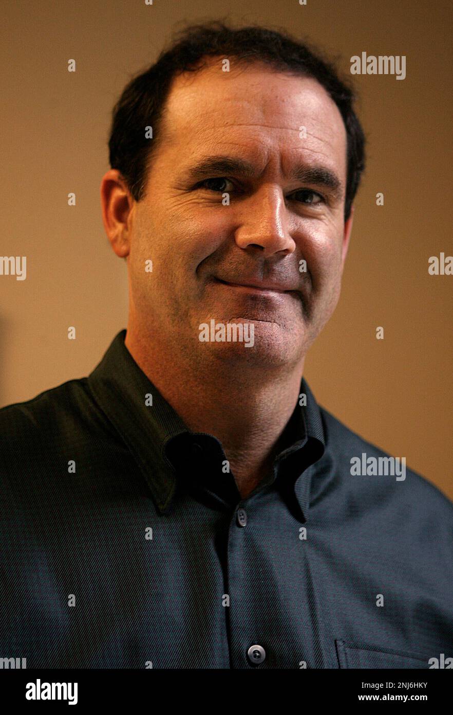 Bart Lally, who's a triathlete, shows his gear. (Liz Hafalia/San ...