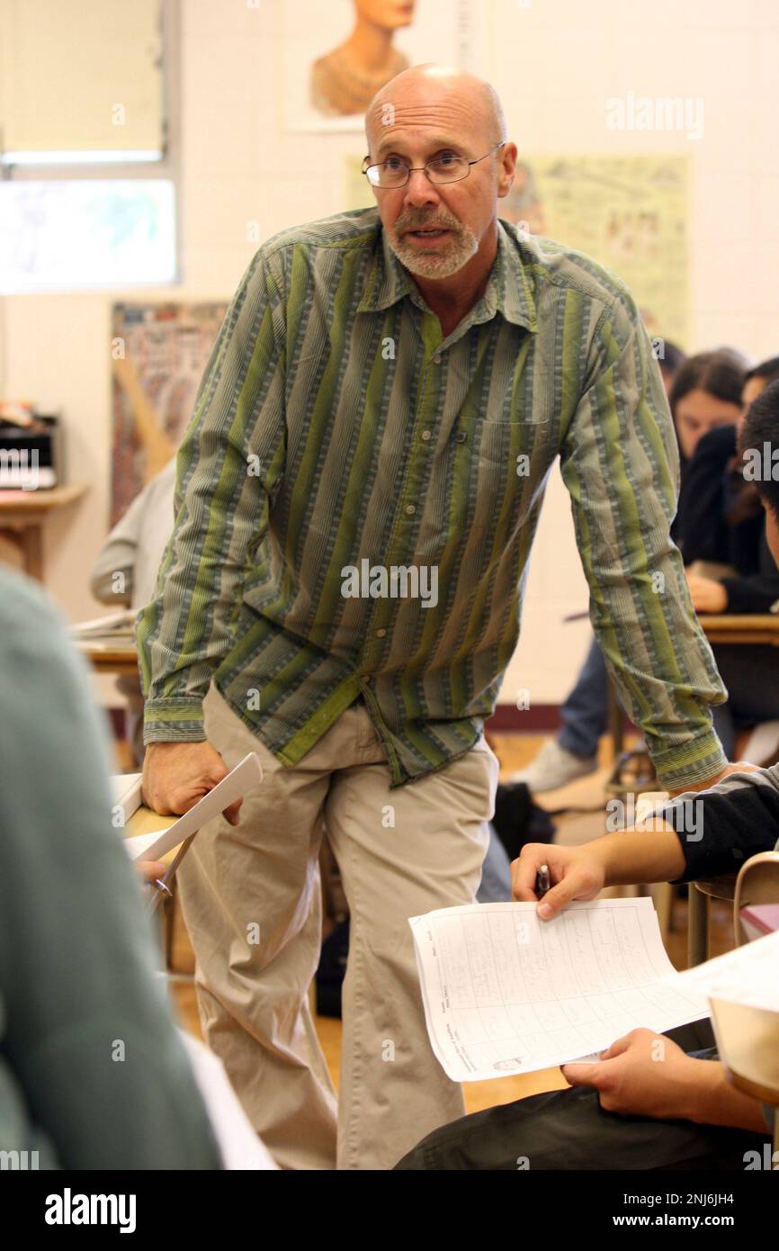 Lowell High school teacher Richard Girling instructing a senior class ...