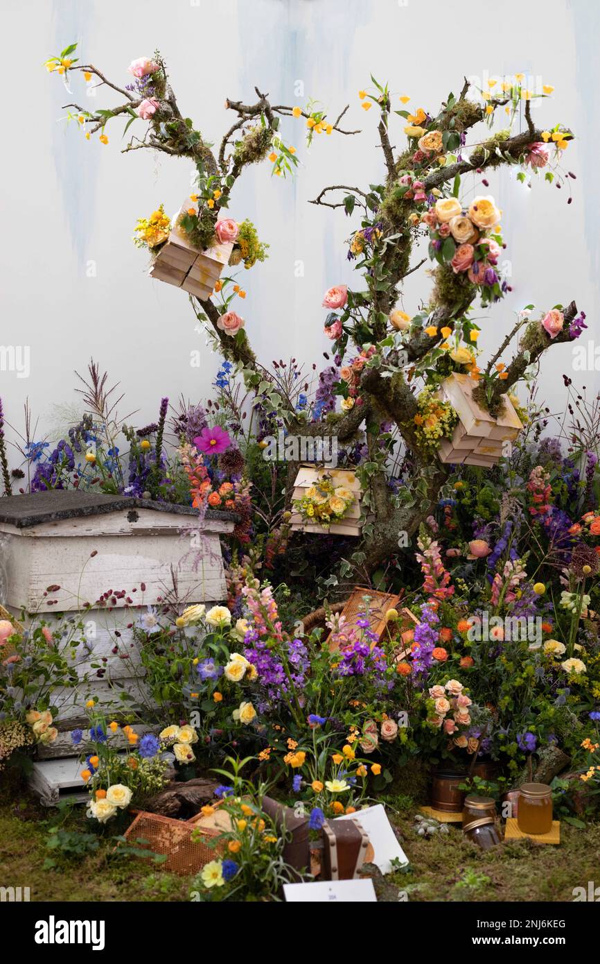 Beehive, honey pots and flowers display at Chelsea Flower Show 2021 ...