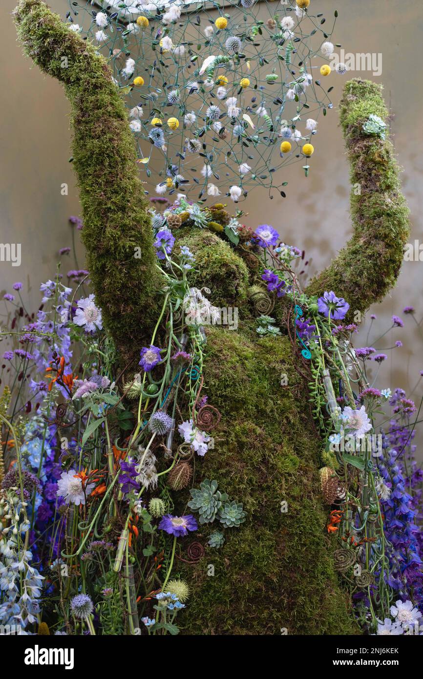 Green moss man or woman reaching upwards. Display at Chelsea Flower ...