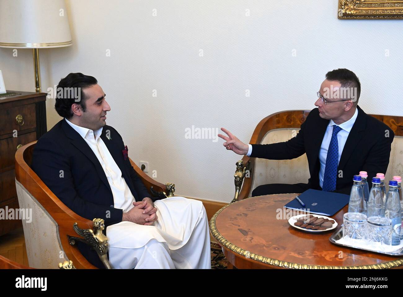 Hungarian Minister of Foreign Affairs and Trade Peter Szijjarto, right ...