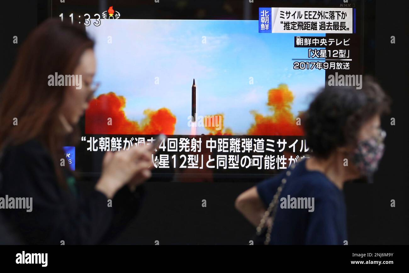 A TV monitor announces the news of North Korea's ballistic missile launch in Chiyoda Ward, Tokyo ...