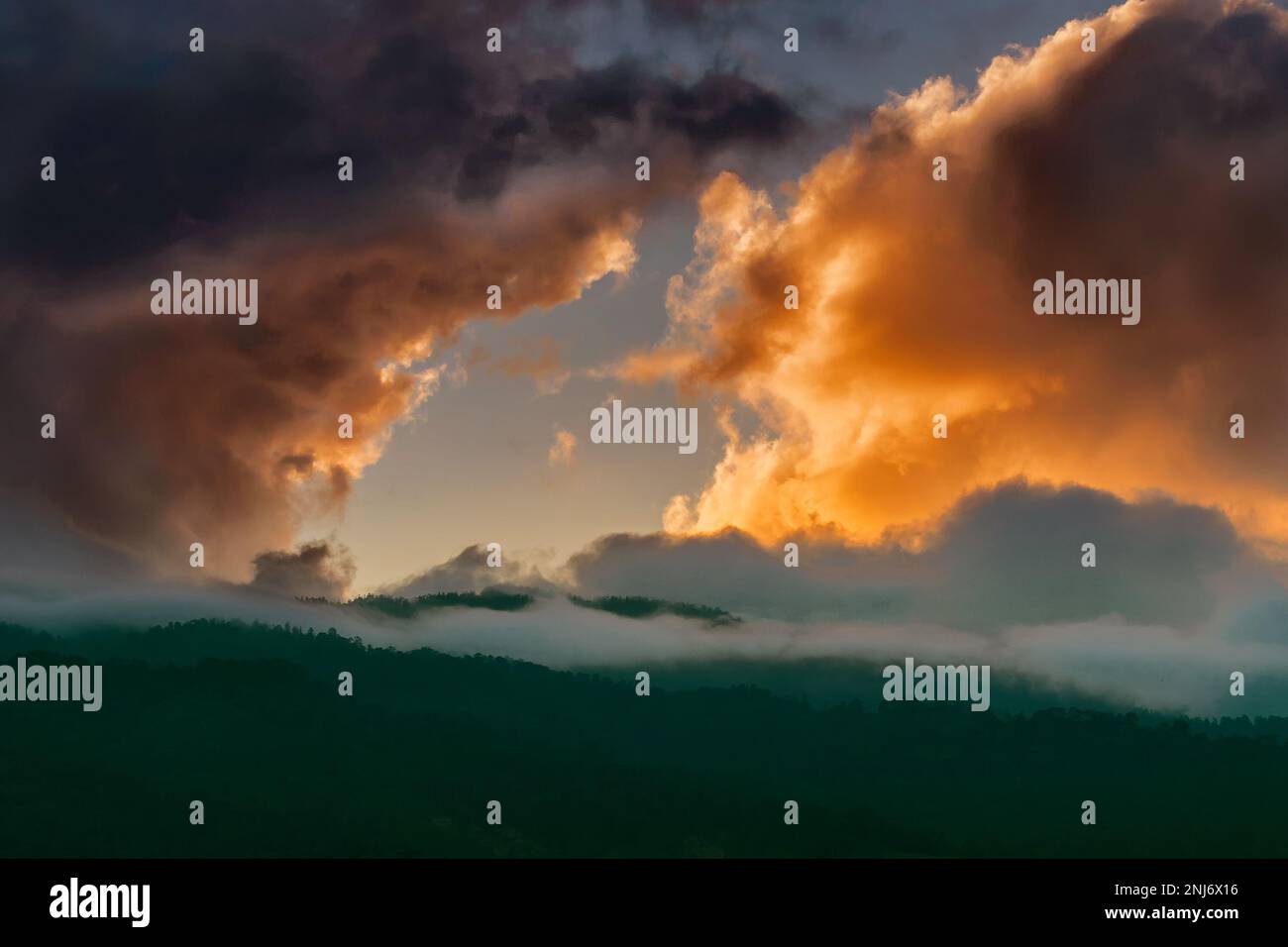 Dramatic clouds over Hiamalayan mountains after sun set, shot at Okhrey ...