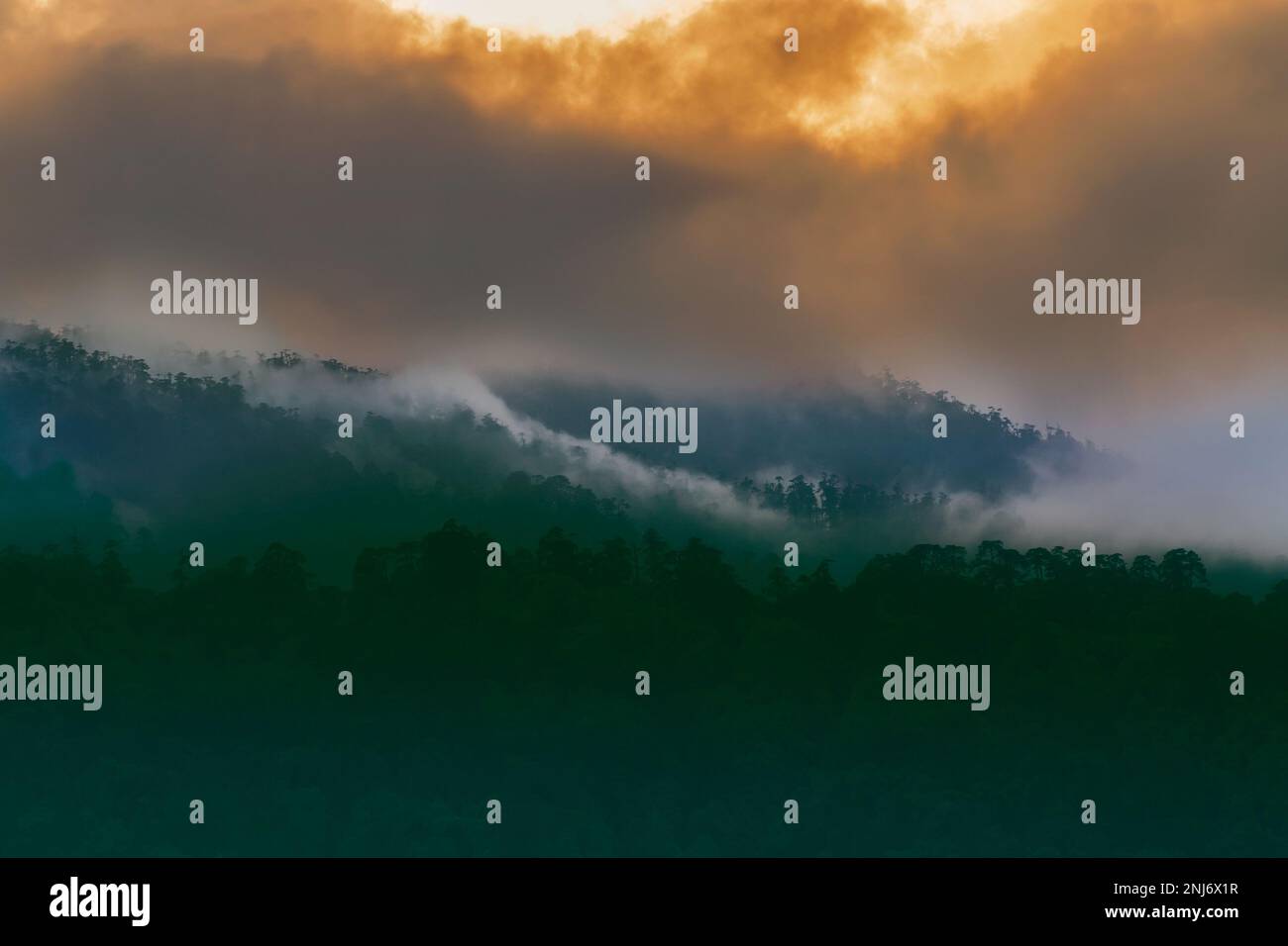 Dramatic clouds over Hiamalayan mountains after sun set, shot at Okhrey ...