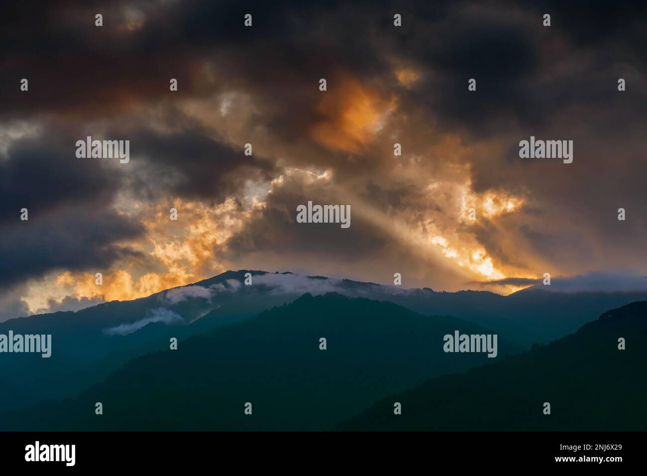 Dramatic clouds over Hiamalayan mountains after sun set, shot at Okhrey ...